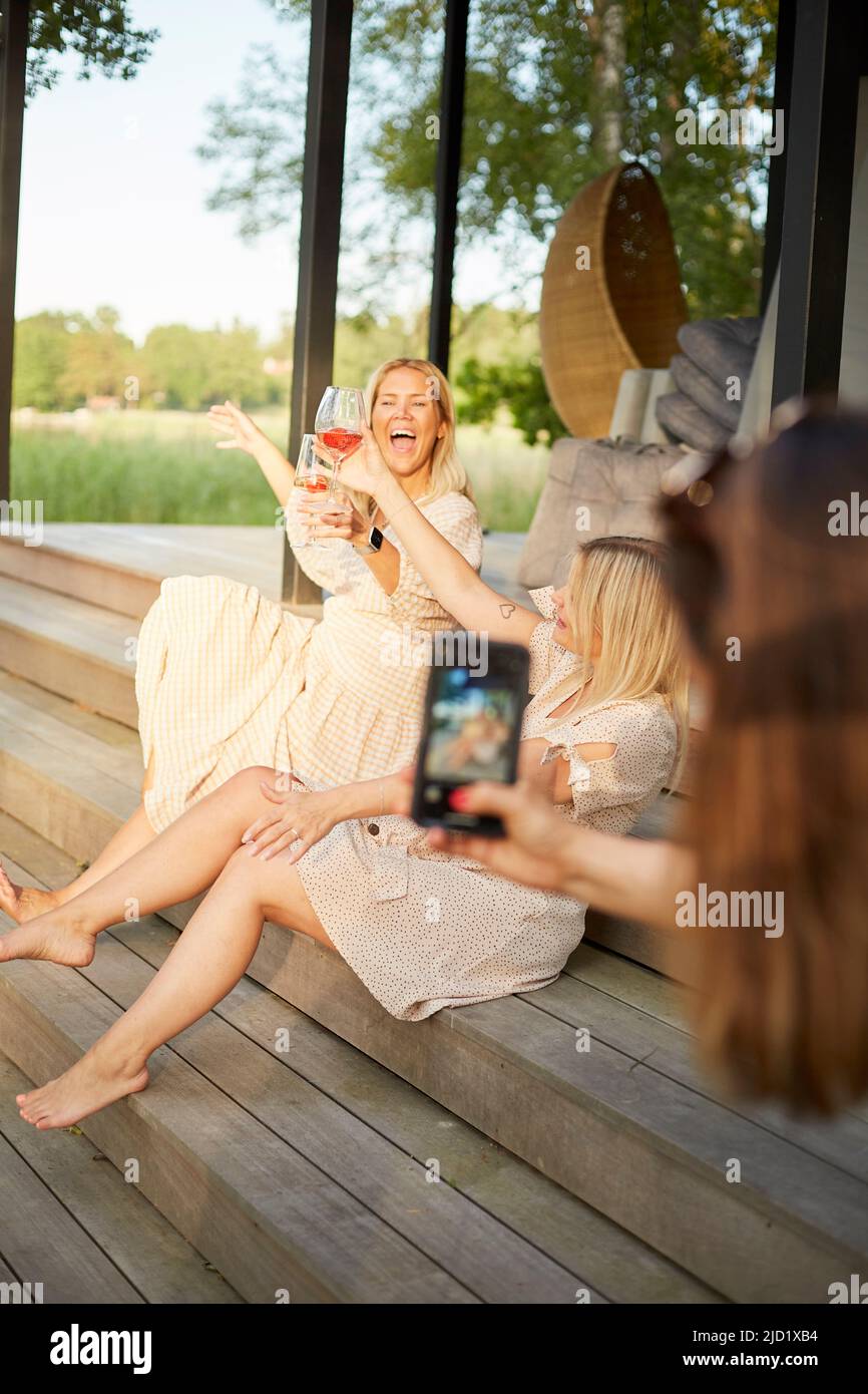 Female friends having fun outdoor Stock Photo - Alamy