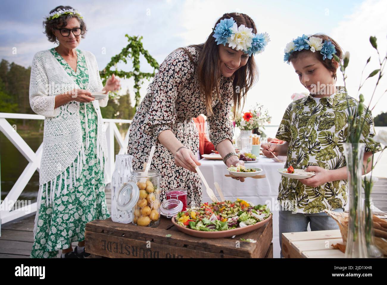 Family of three dinner party hi-res stock photography and images - Alamy
