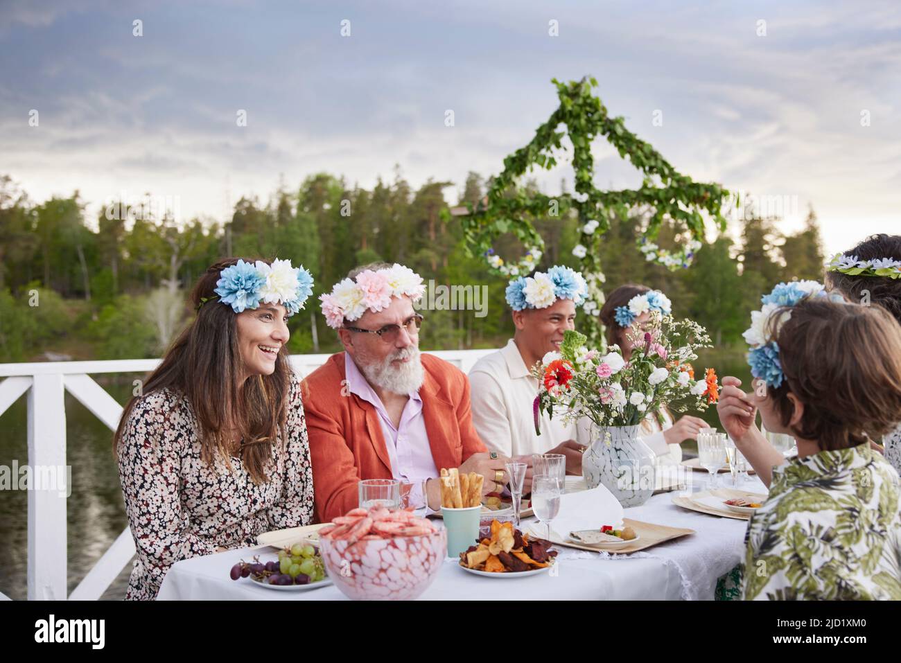 Family having midsummer dinner Stock Photo - Alamy