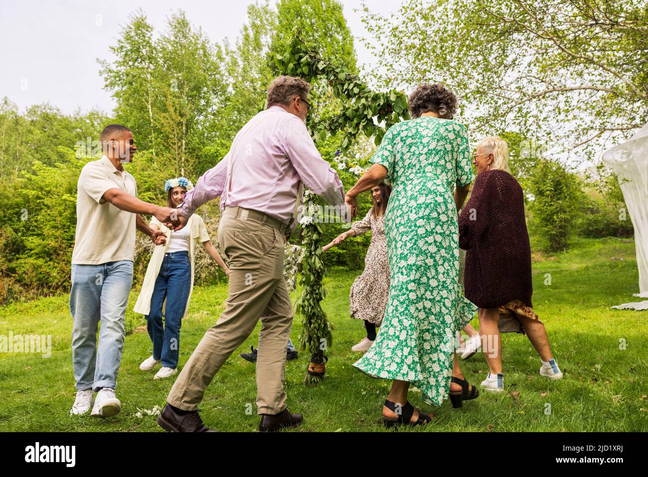 People dancing around midsummer maypole Stock Photo - Alamy