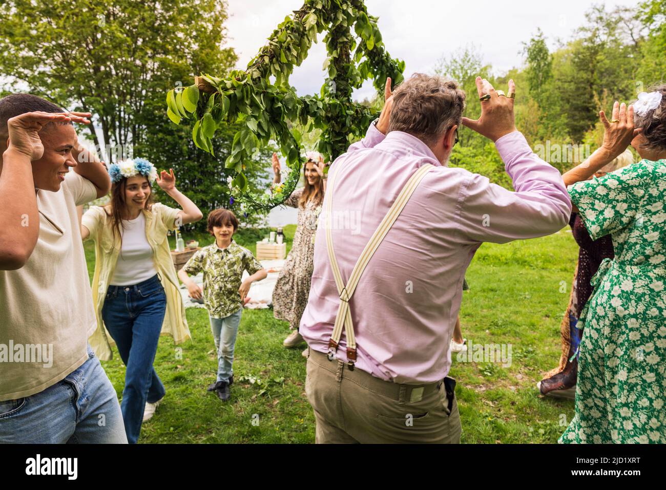 People dancing around midsummer maypole Stock Photo - Alamy