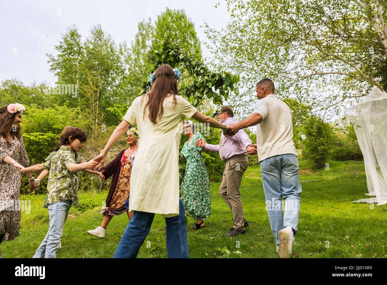 People dancing around midsummer maypole Stock Photo - Alamy