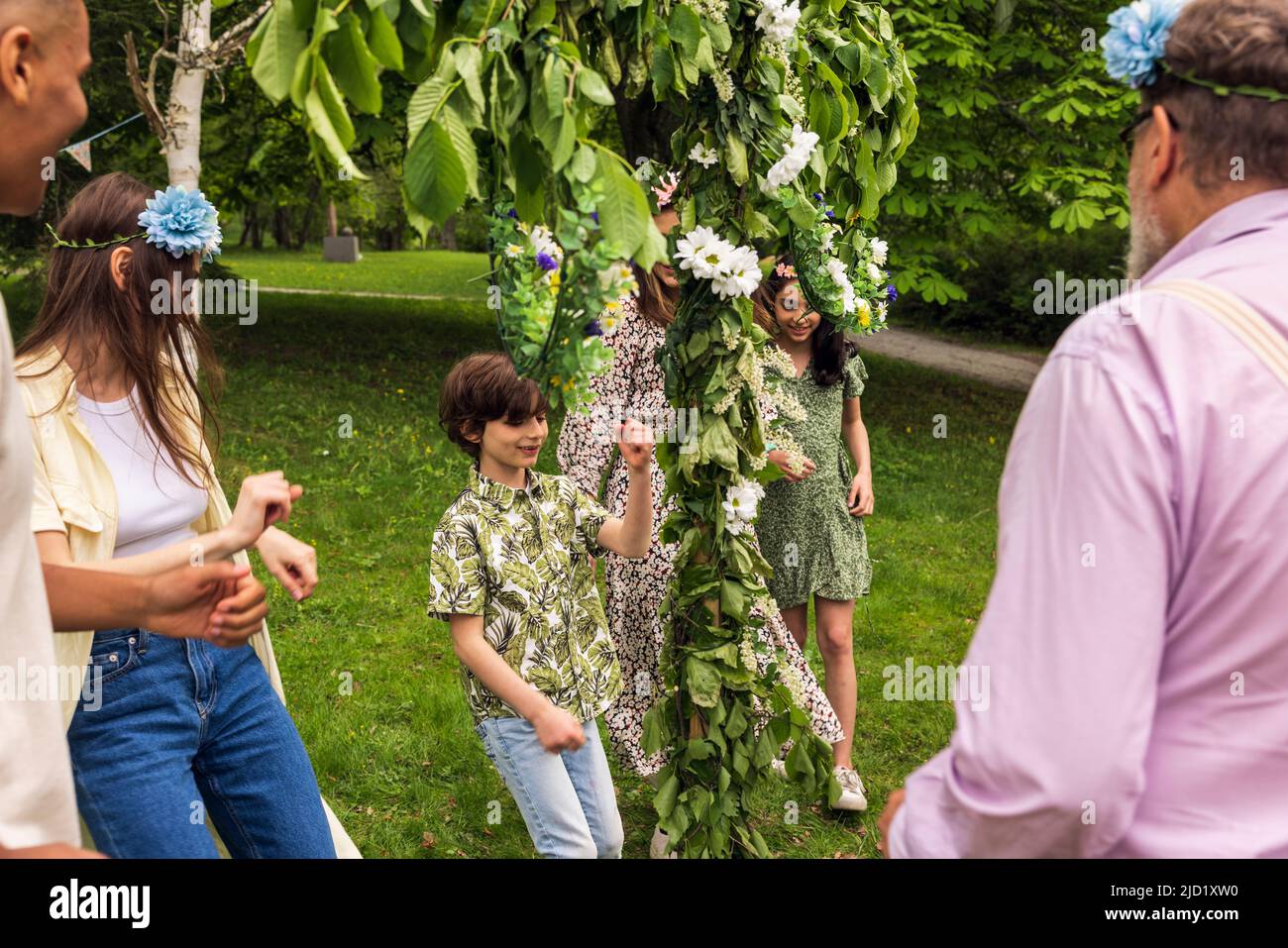 People dancing around midsummer maypole Stock Photo - Alamy