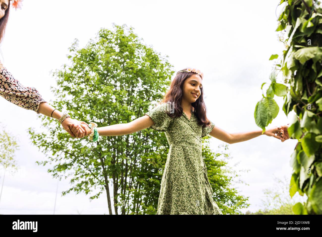 Girl dancing around midsummer maypole Stock Photo - Alamy