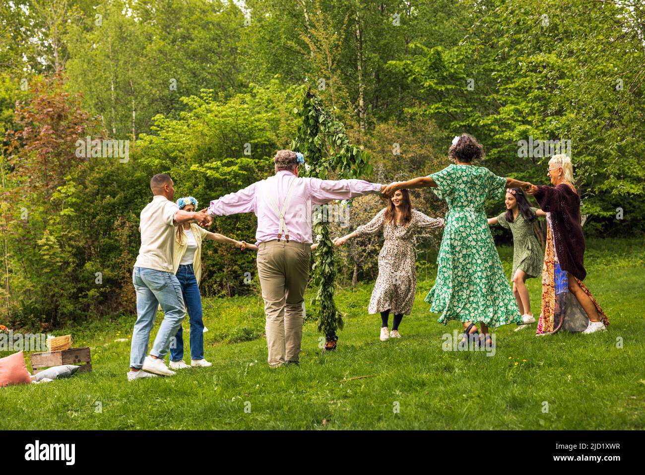People dancing around midsummer maypole Stock Photo - Alamy
