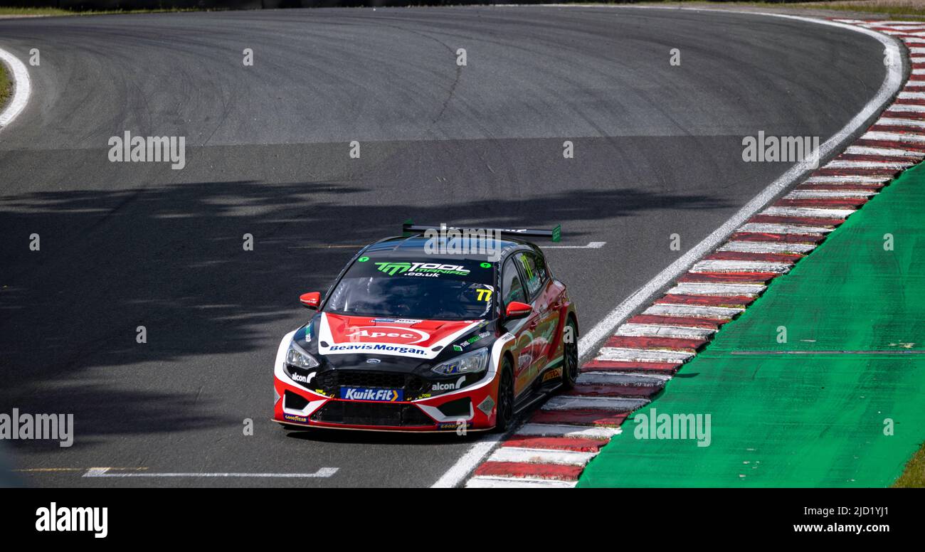 Sam Osborne, number 77, driving for Apec Racing with Beavis Morgan ...