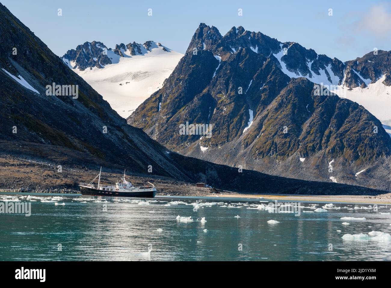 The expedition vessel M/S Togo in Trinity Harbour, Magdalene Fjord ...