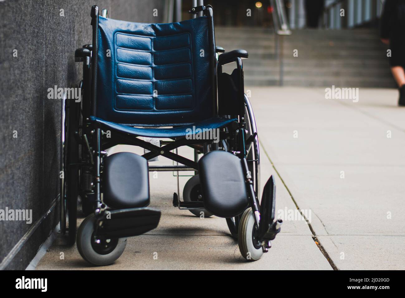Empty Wheelchair Available To Assist Patients Outside of Hospital ...