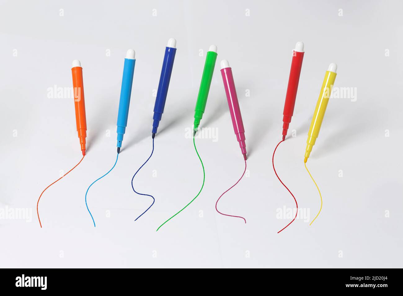 colorful marker pens drawing lines on paper Stock Photo - Alamy