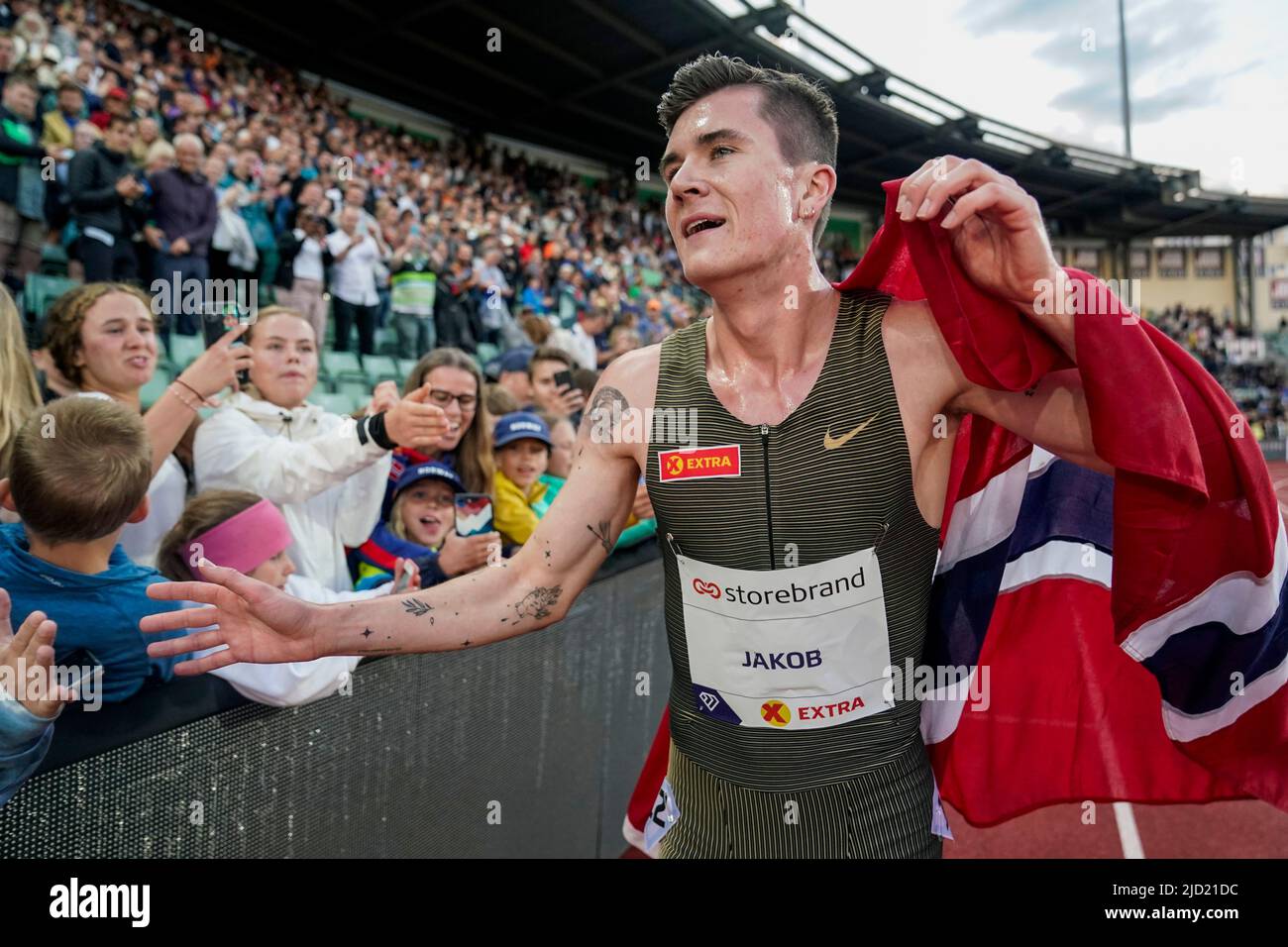Oslo 20220616.Jakob Ingebrigtsen celebrates after finishing first in ...