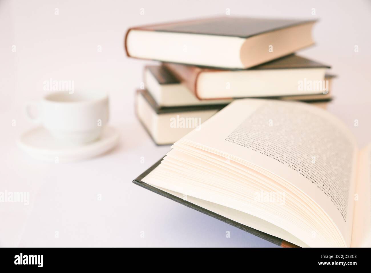 Stacked Books And Coffee