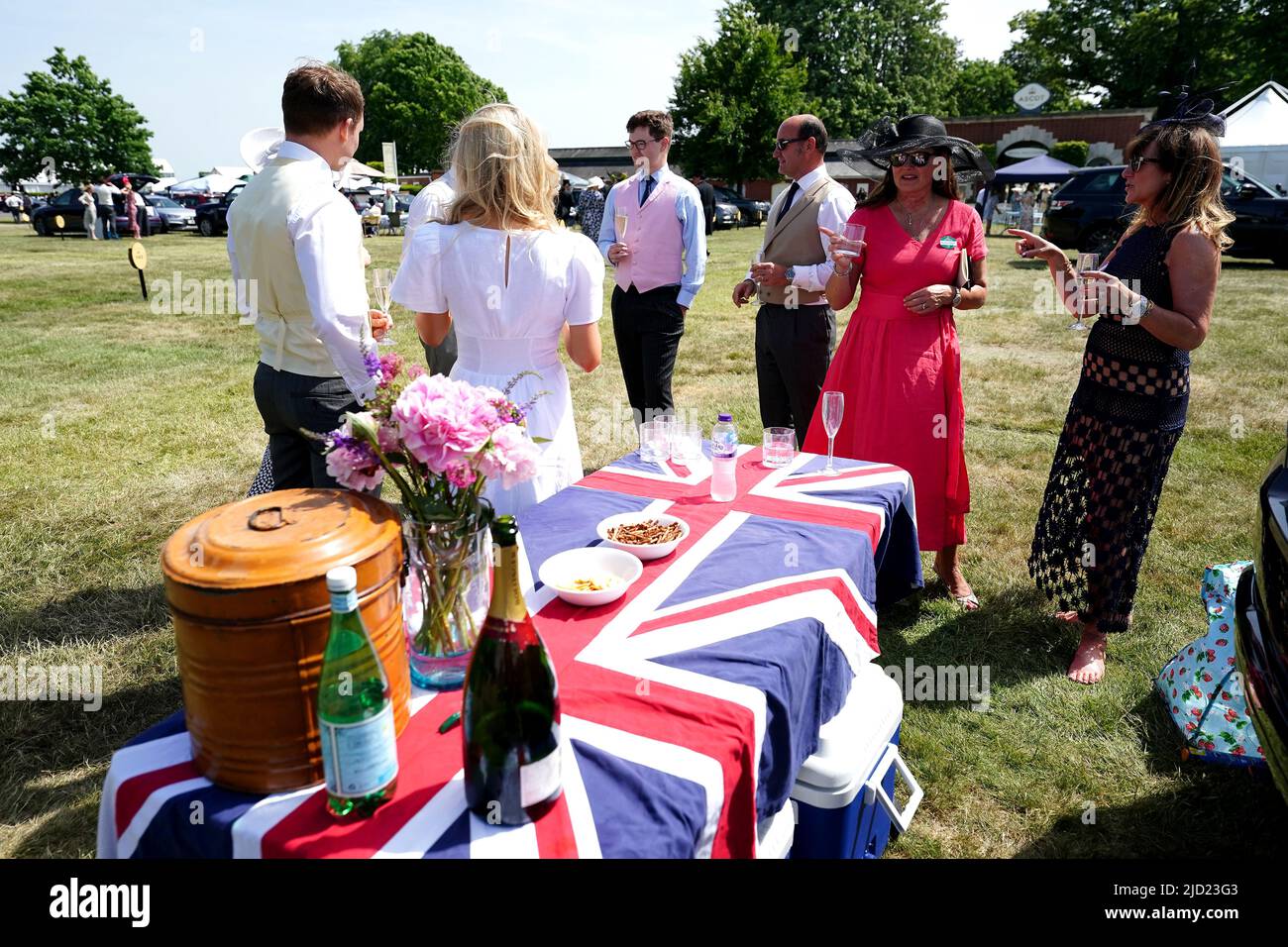 Racegoers enjoy drinks and a picnic in the carpark ahead of day four of ...