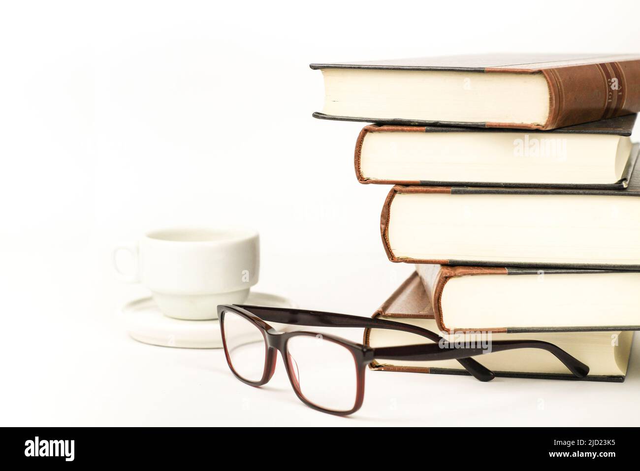 Stack books eyeglasses cup hi-res stock photography and images - Alamy