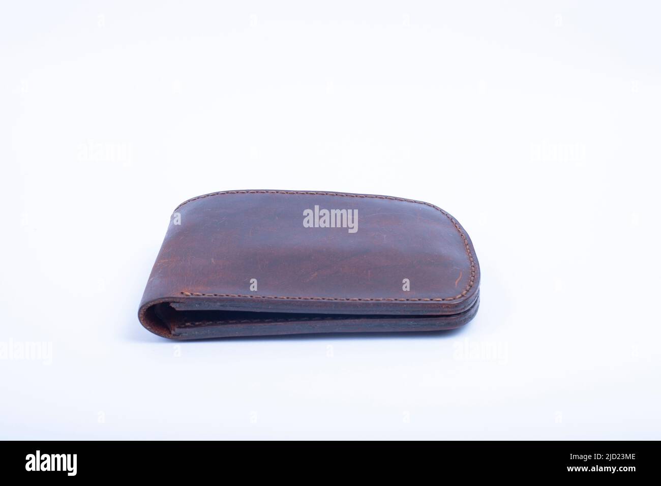 leather wallet with banknotes and credit card inside isolated on white ...