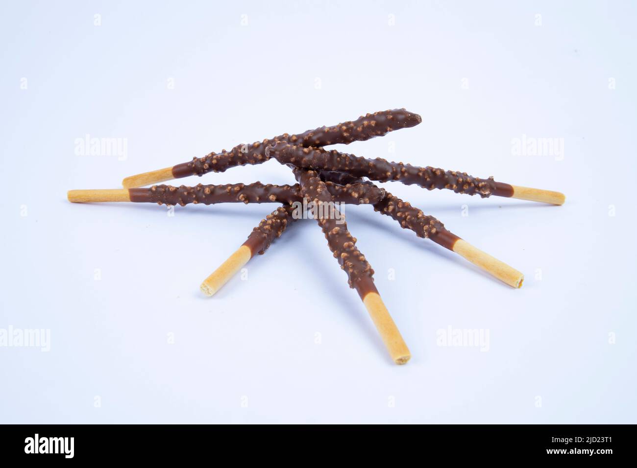 Chocolate covered cracker stick on a white background Stock Photo - Alamy
