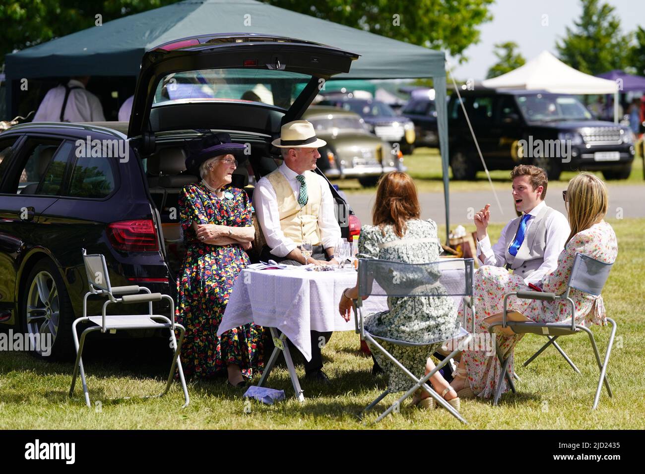 Racegoers enjoy a picnic in the car park ahead of day four of Royal ...