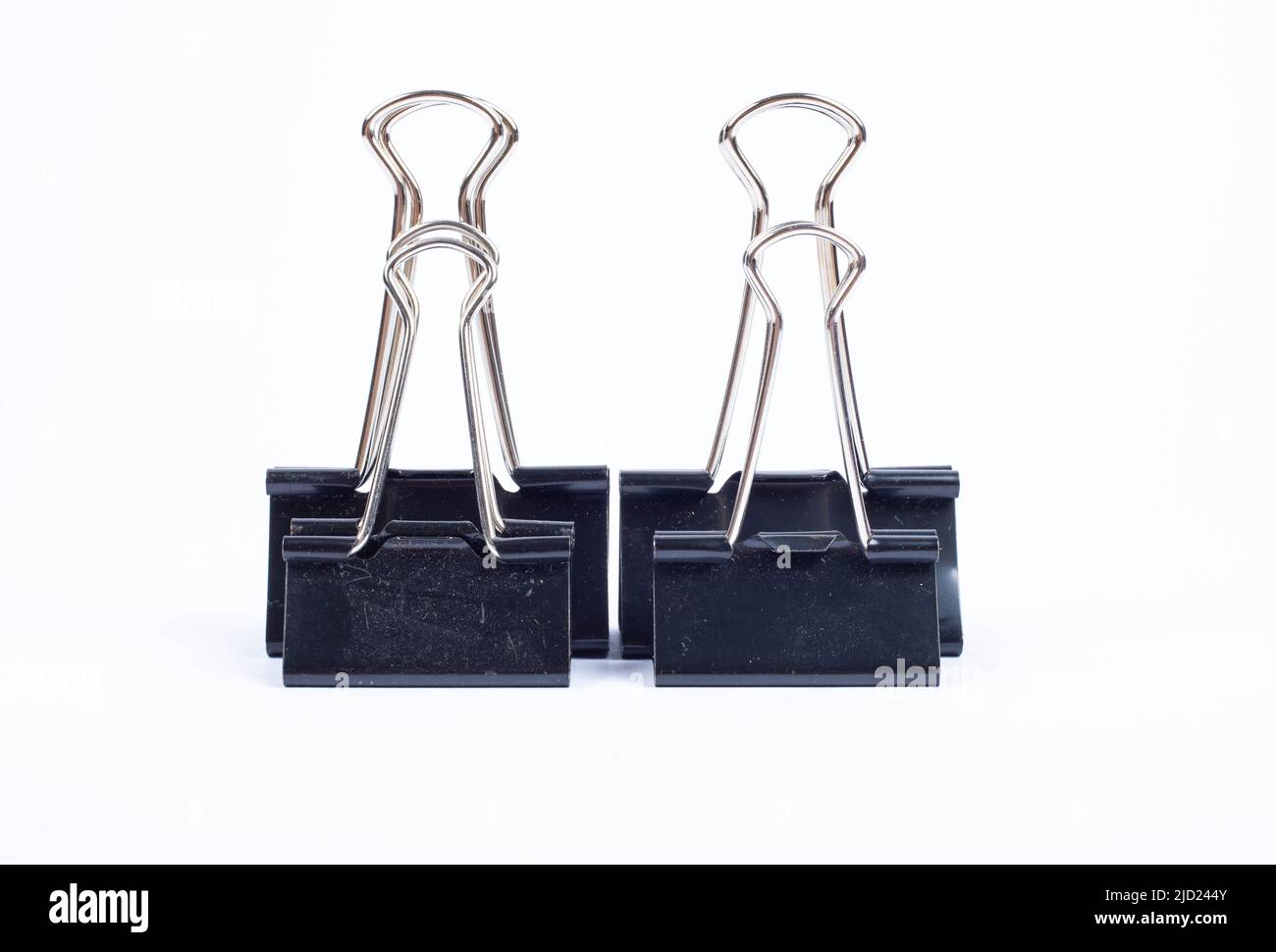 An image of black paper clips on white Stock Photo - Alamy