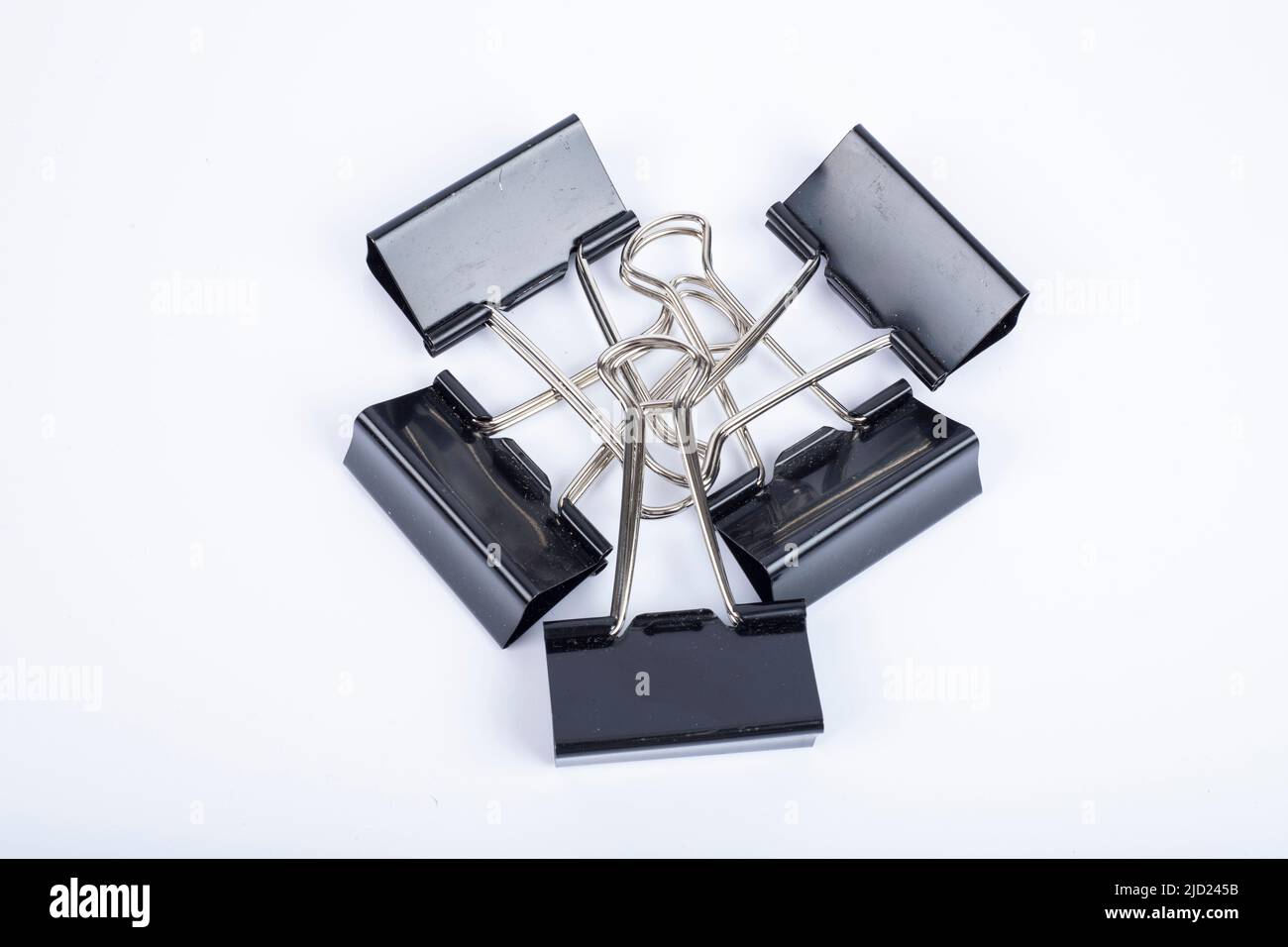 An image of black paper clips on white Stock Photo - Alamy