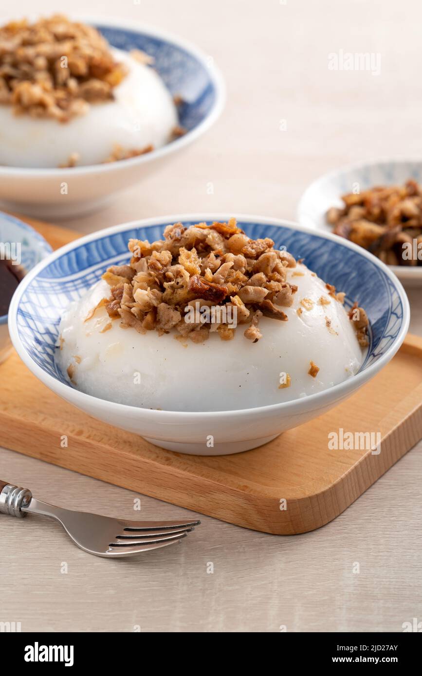 Taiwanese savory rice pudding Wa gui, rice cake with chopped dried ...