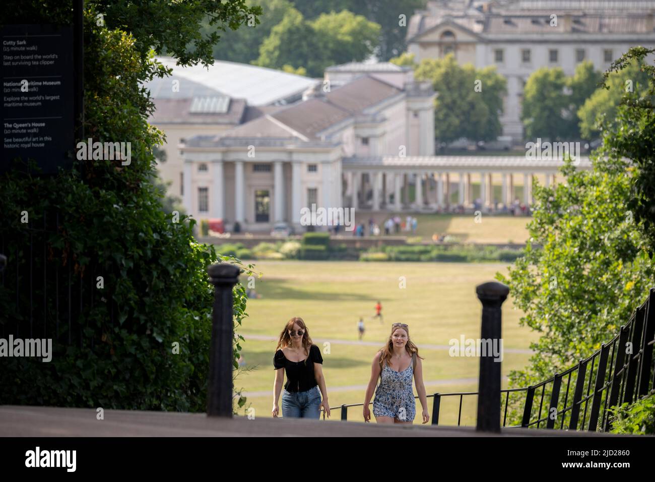 Visitors to Greenwich Park climb the steep gradient of the hill that ...
