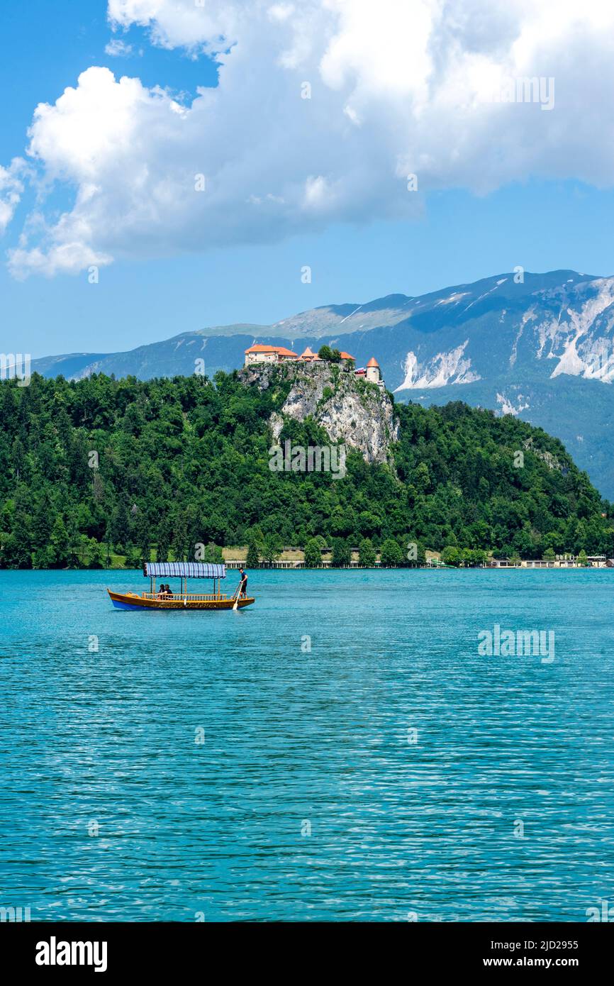 Boat and Castle in idyllic Lake Bled, Slovenia Stock Photo - Alamy