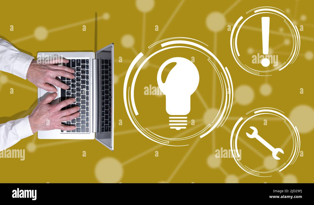 Top view of hands using laptop with symbol of innovation concept Stock ...