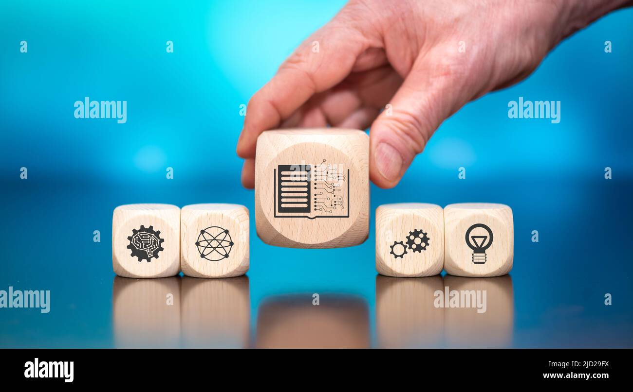 Wooden blocks with symbol of machine learning concept on blue ...