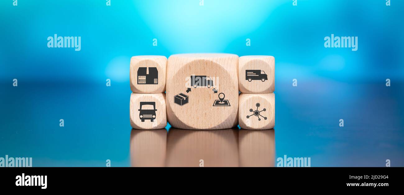 Wooden blocks with symbol of delivery concept on blue background Stock ...