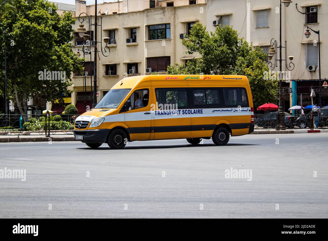 Fez, Morocco - June 16, 2022 School bus driving through the streets of ...