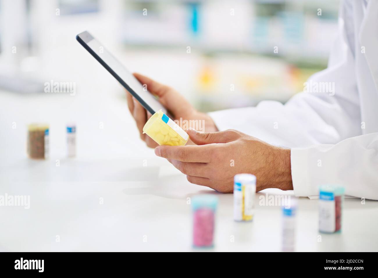 Pharmacist prescription on tablet hi-res stock photography and images ...