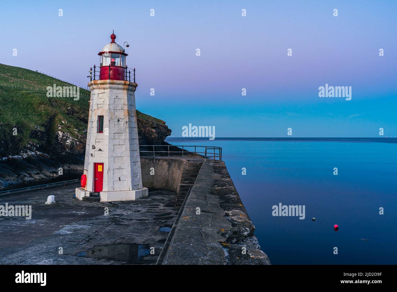 Sunset over Lybster Lighthouse and Harbour, East Coast of Scotland , UK ...