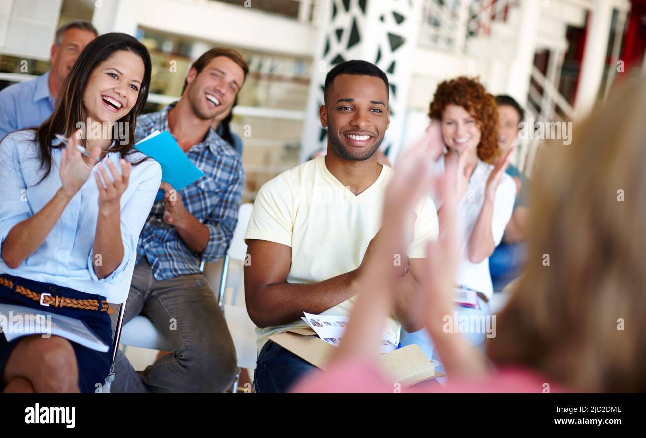 Giving themselves a round of applause. Shot of coworkers applauding a ... Giving themselves a round of applause. Shot of coworkers applauding a ...