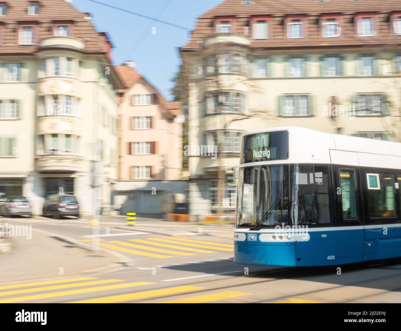 Zurich, Switzerland - March 26th 2022: A fast tram passing historic ...