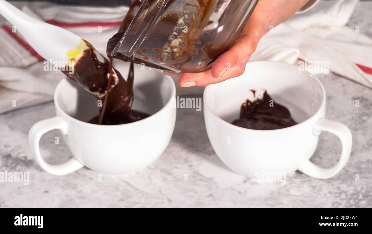 Step by step. Pouring chocolate cake batter into the cups to prepare ...