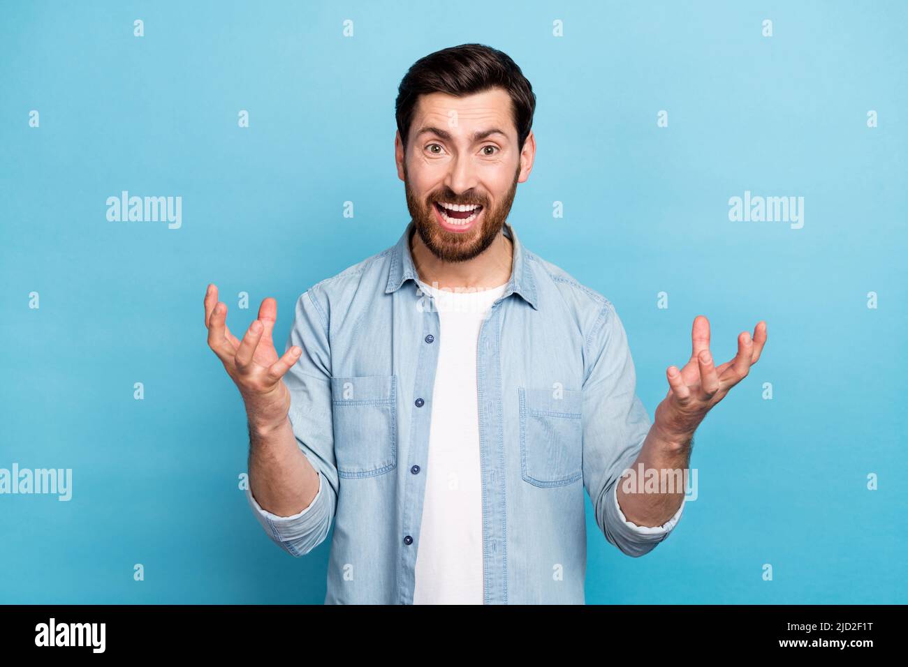 Photo of frustrated guy have misunderstanding scream hate wear denim ...