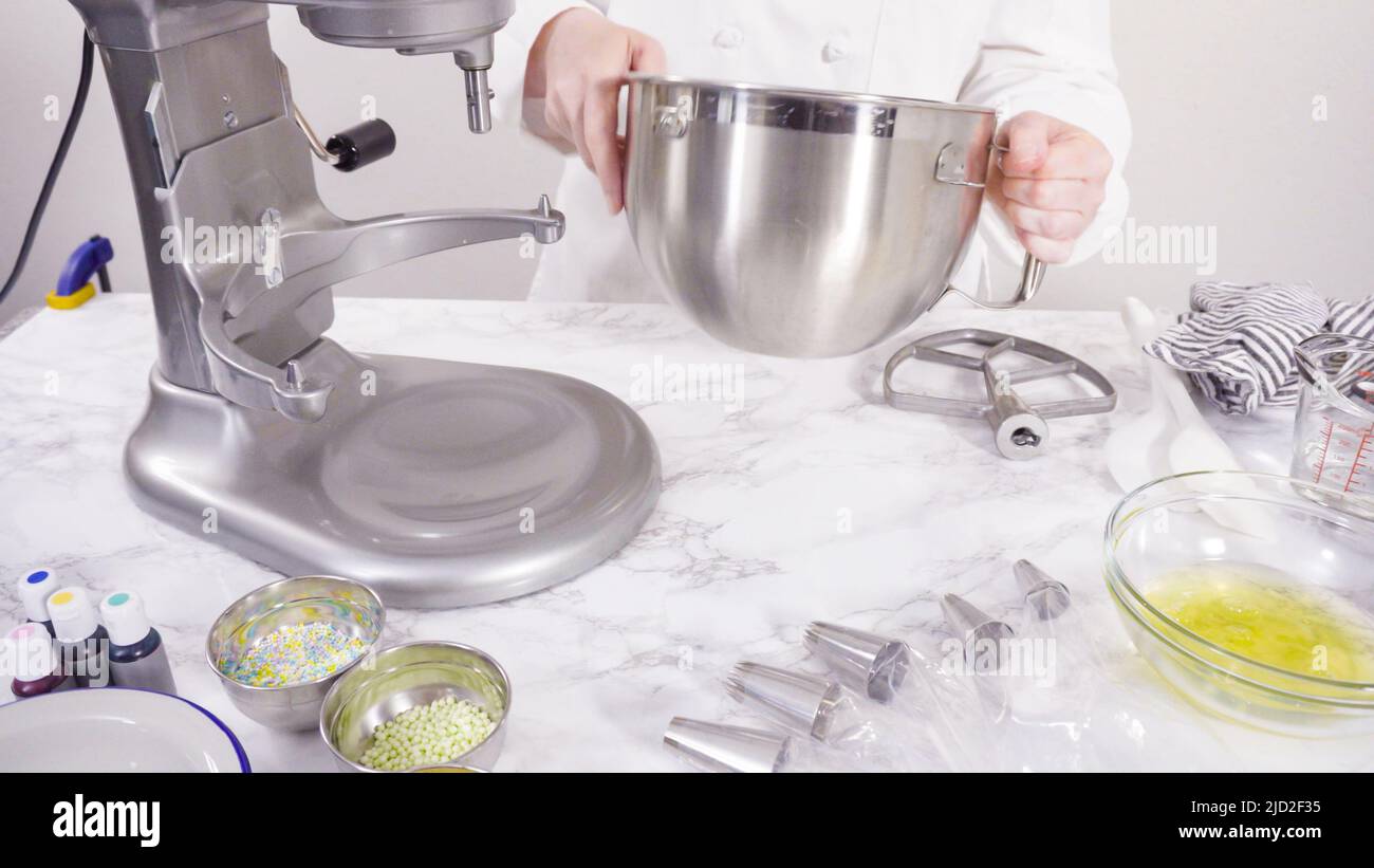 Mixing ingredients to bake sheet cake with Italian buttercream frosting ...