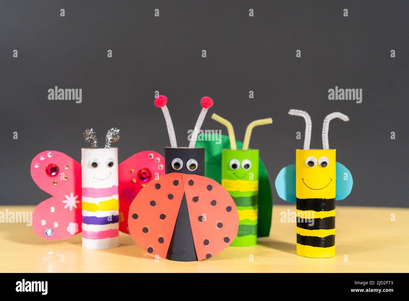 Papercraft project. Colorful bugs made out of empty toilet rolls Stock ...