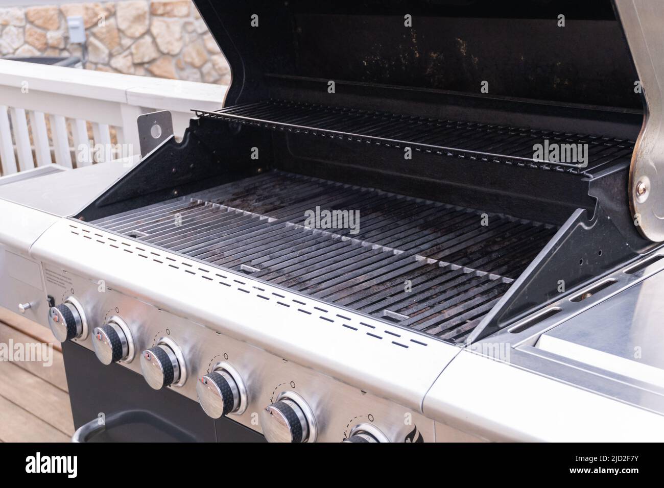 Clean six-burner gas grill ready for summer grilling Stock Photo - Alamy