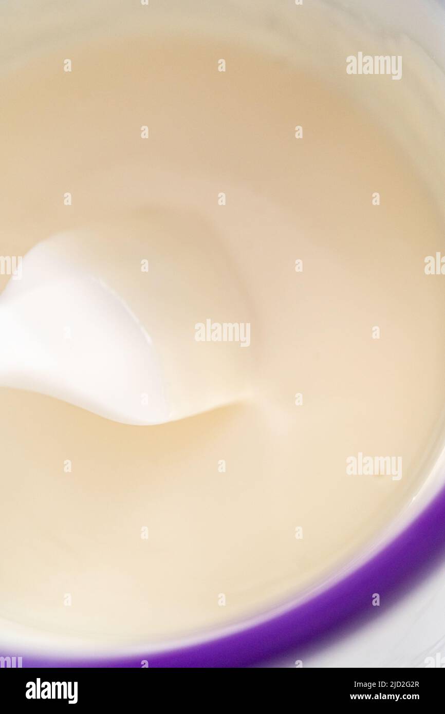 Melting chocolate melts in a candy melting pot to prepare mermaid tails ...