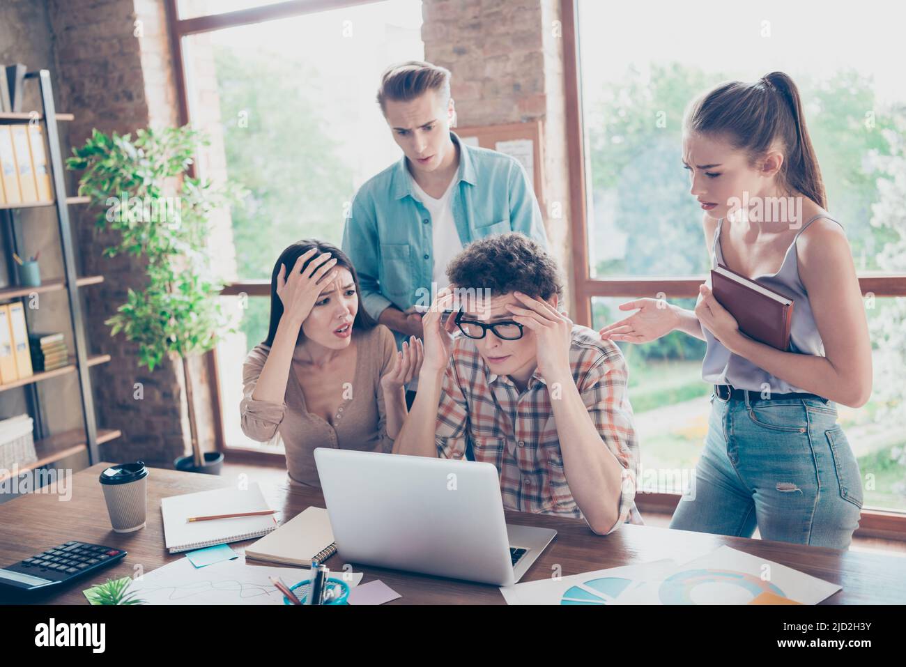 Photo of college students gather in library feel sorry for their friend ...
