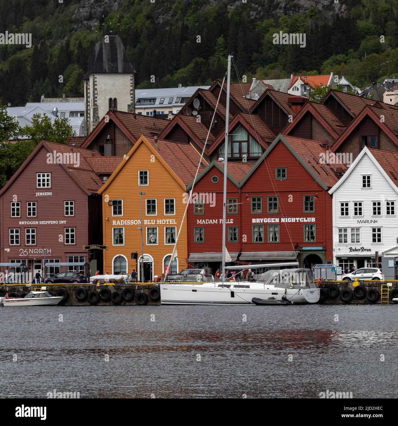 Sailboat Timeout visiting the port of Bergen, Norway. Alongside Bryggen ...