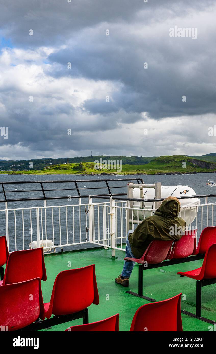 Onboard the ferry departing for the Isle of Mull, looking back to the ...