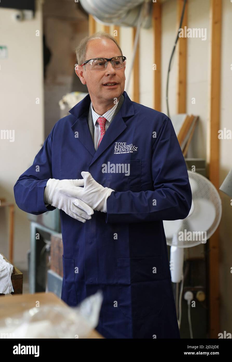 The Earl of Wessex, polishing a Commonwealth games medal during a visit ...