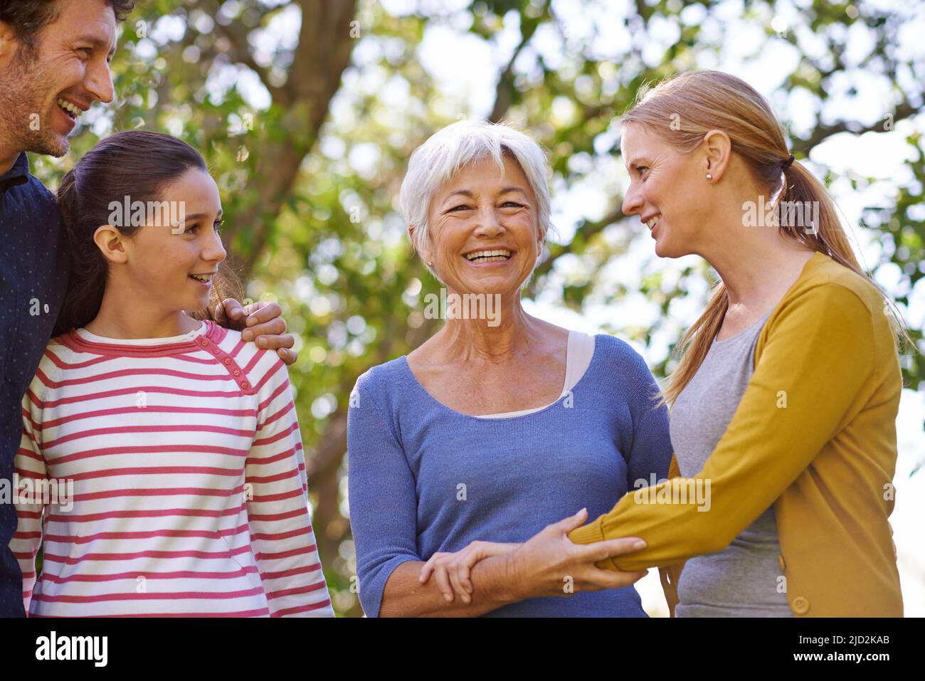 The family matriarch. Shot of a family standing together outside in the ...