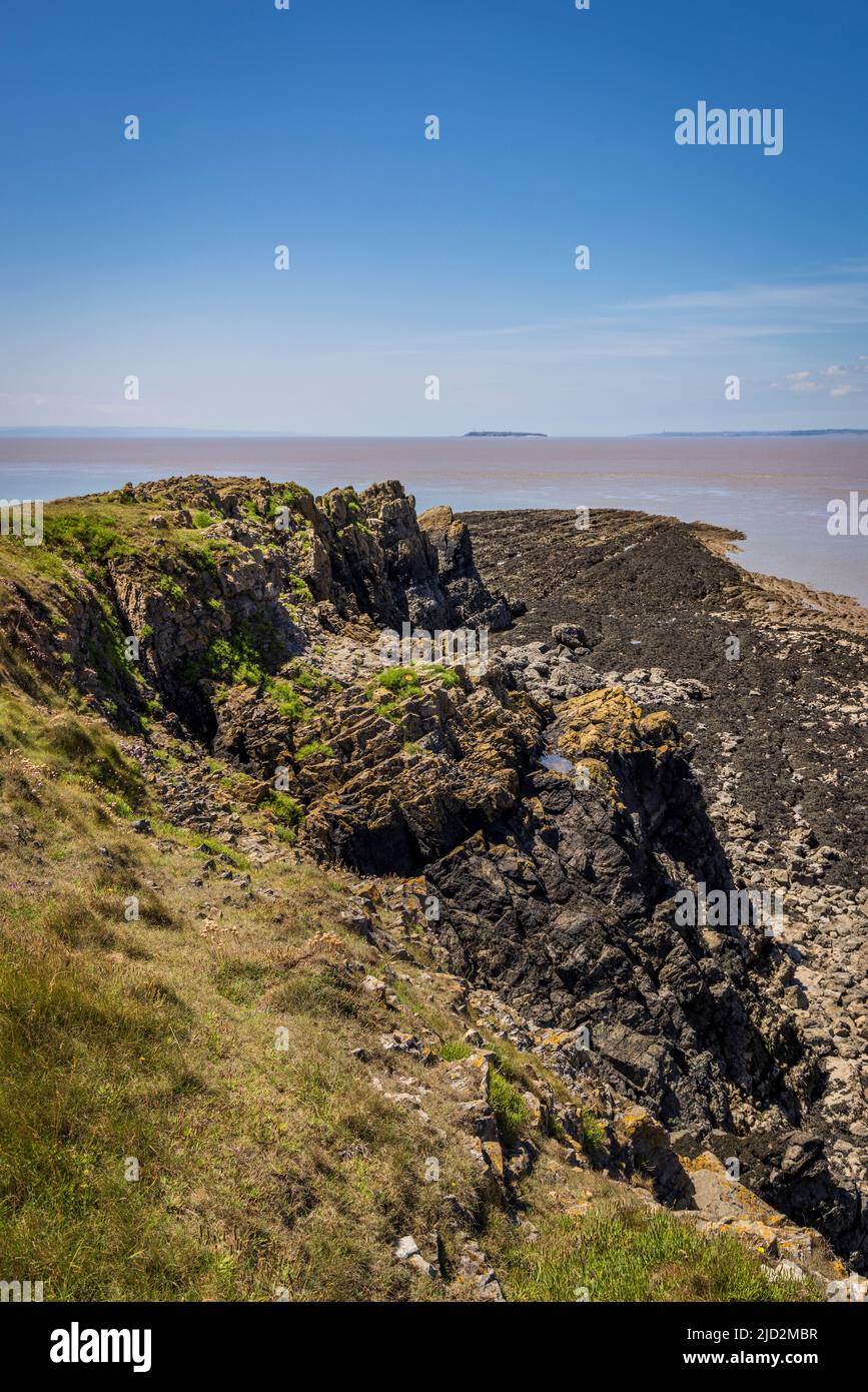 West across the rocks of Sand Point to Flat Holm island and the Devon ...