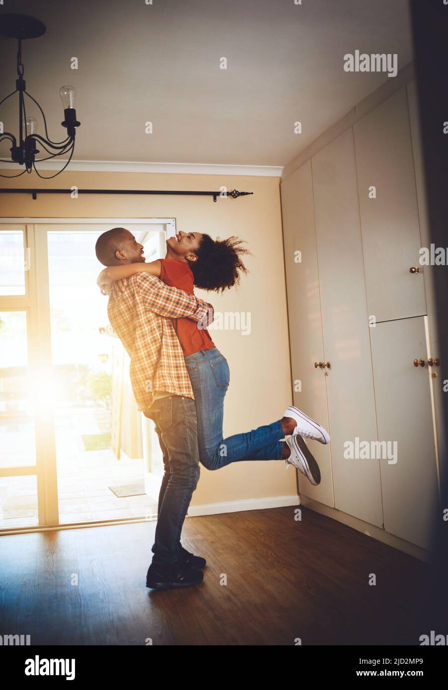 Happiness is enjoying the simple moments together. Shot of a young ...