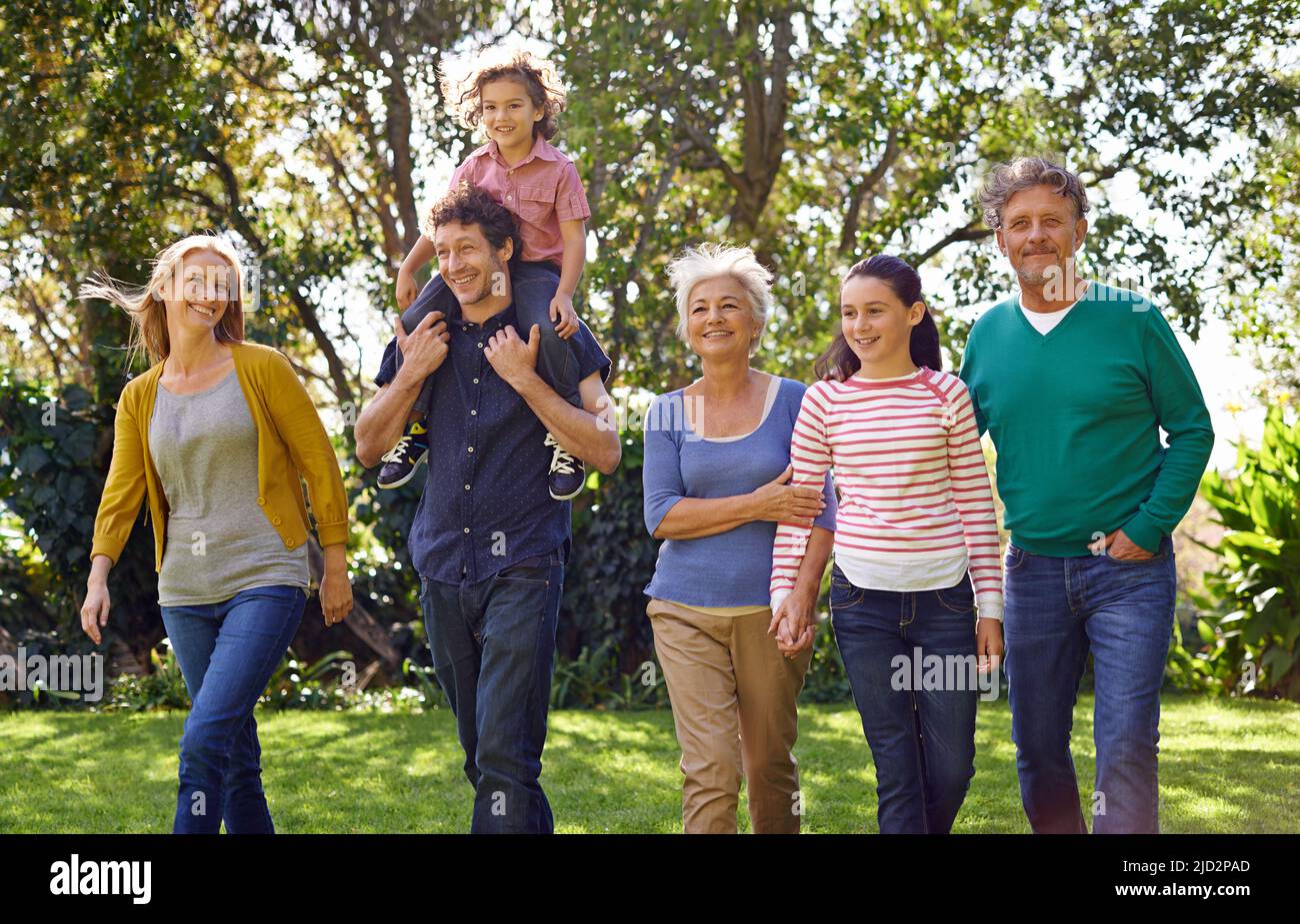 Getting the generations together. Shot of a happy multi-generational ...