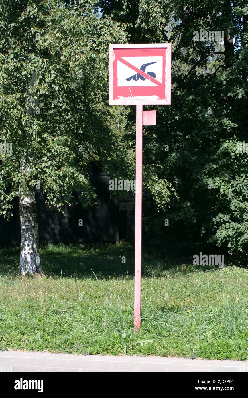 swim prohibitory sign at summer sunny day Stock Photo - Alamy