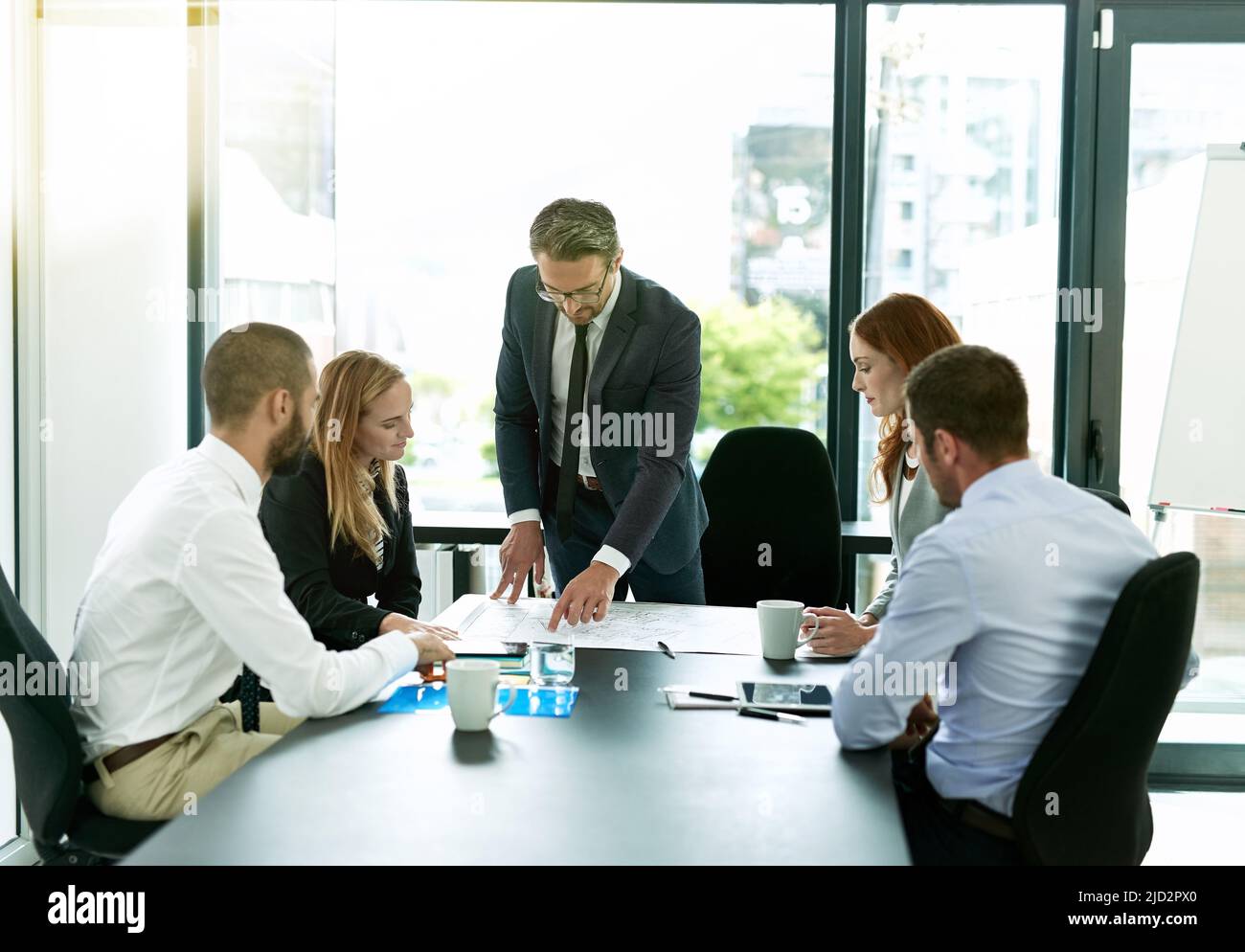 Making sure their meetings are informative and productive. Shot of a ...