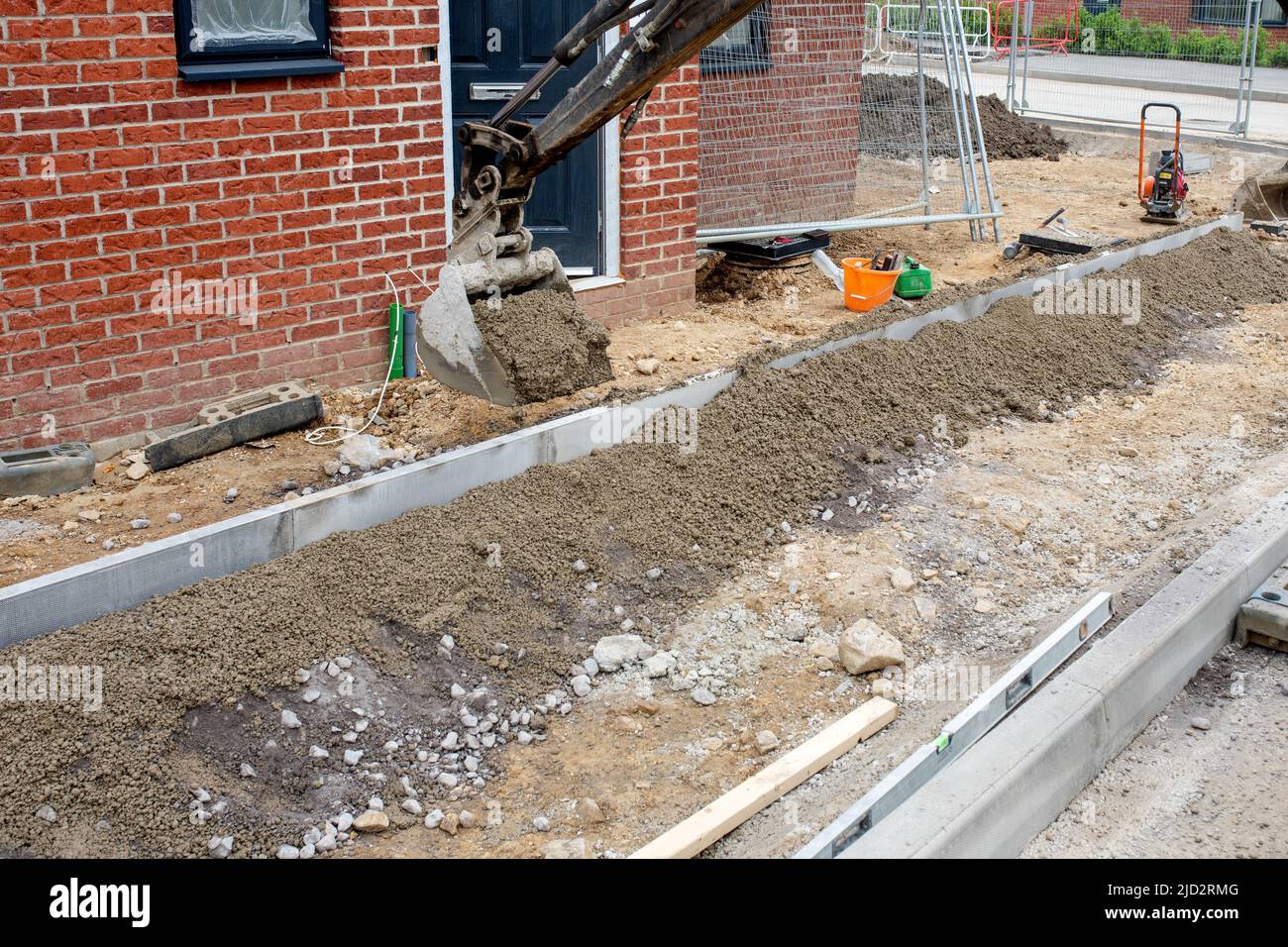 Construction workers finishing construction of new residential house ...
